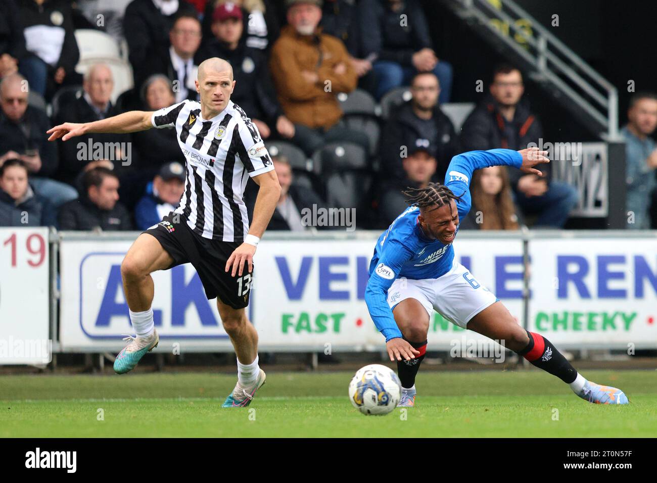 Rangers' Zak Lovelace falls to the fall after a battle for the ball ...