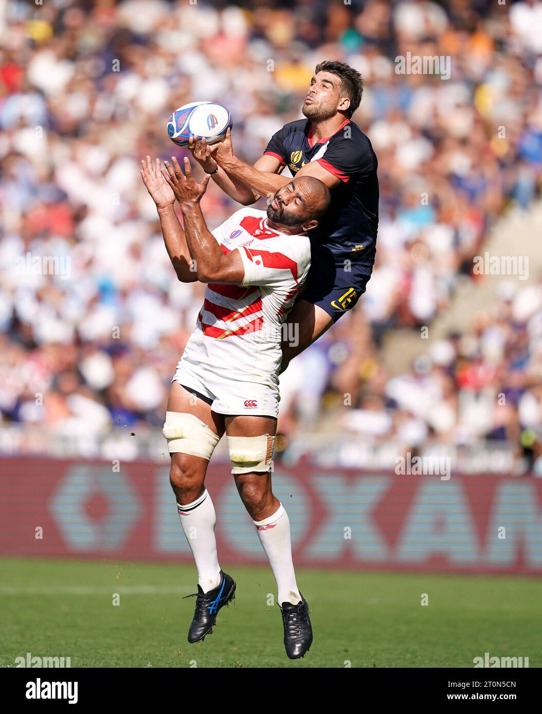 Japan's Michael Leitch and Argentina's Juan Cruz Mallia compete for a ...