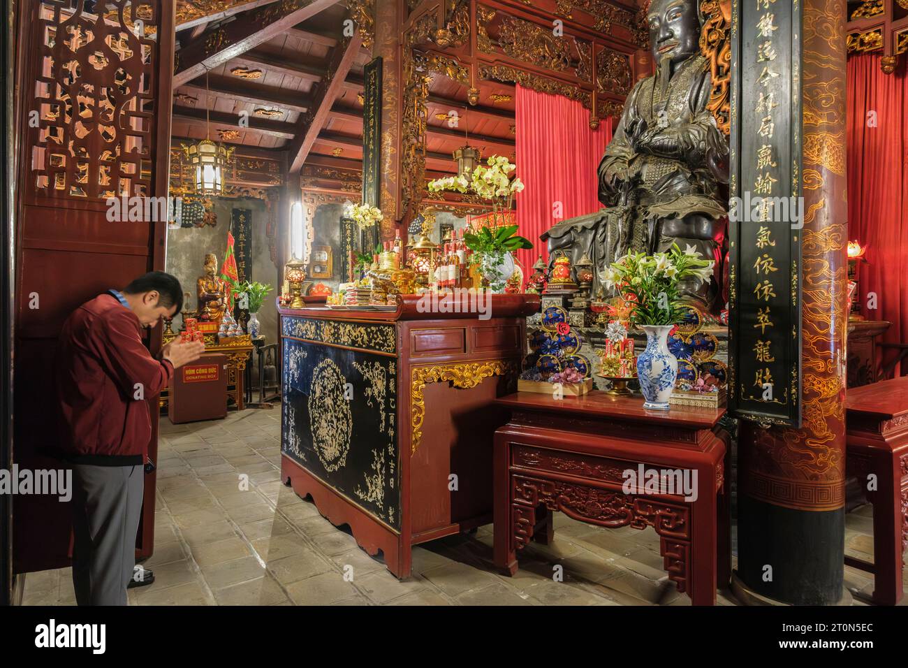 Hanoi, Vietnam. Quan Thanh Temple, a Taoist Temple. Man Praying in ...