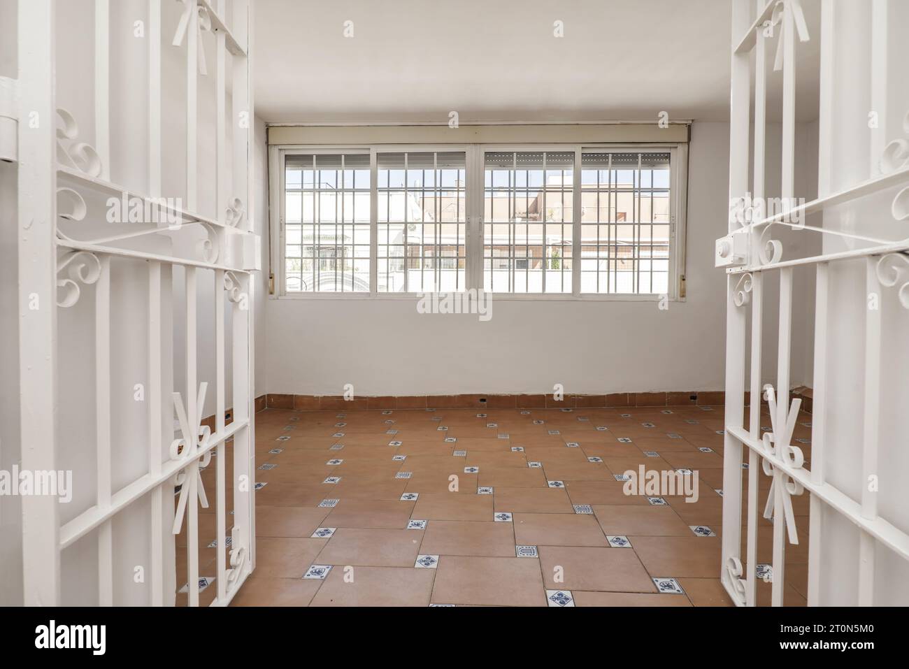 Closed terrace with bars on the attic floor with large windows Stock ...