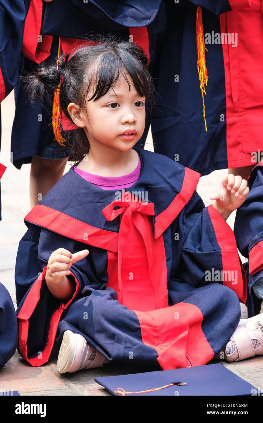 Hanoi, Vietnam. Temple of Literature, Van Mieu. Little Girl Getting ...