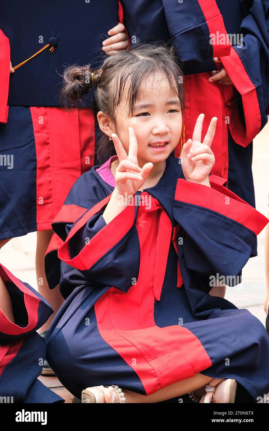 Hanoi, Vietnam. Temple of Literature, Van Mieu. Little Girl Getting ...