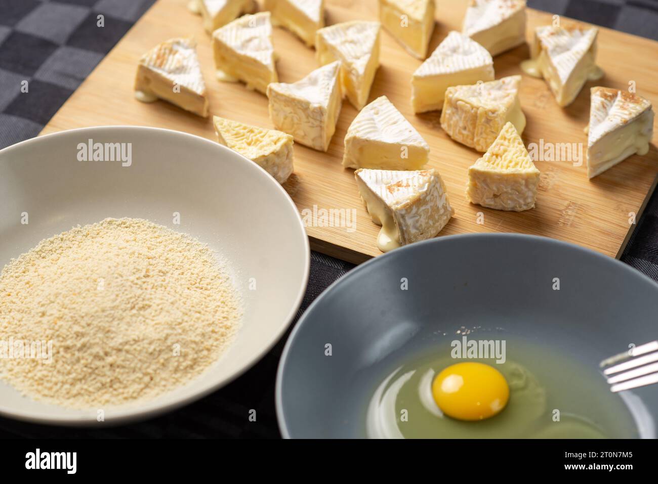 Making breaded Camembert cheese Stock Photo - Alamy