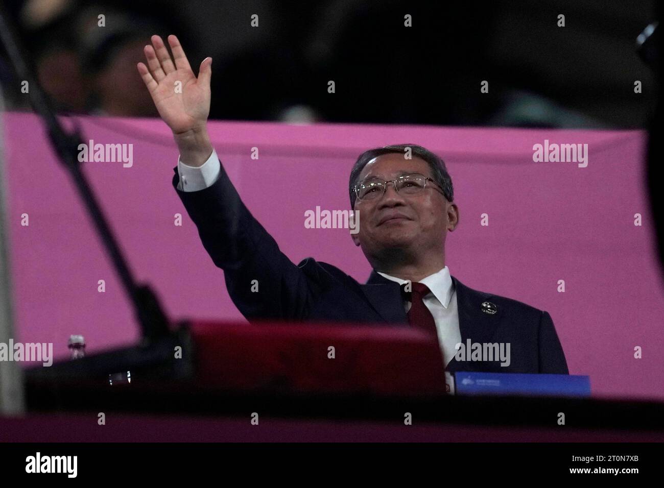 Chinese Premier Li Qiang waves as he attends the closing ceremony of ...
