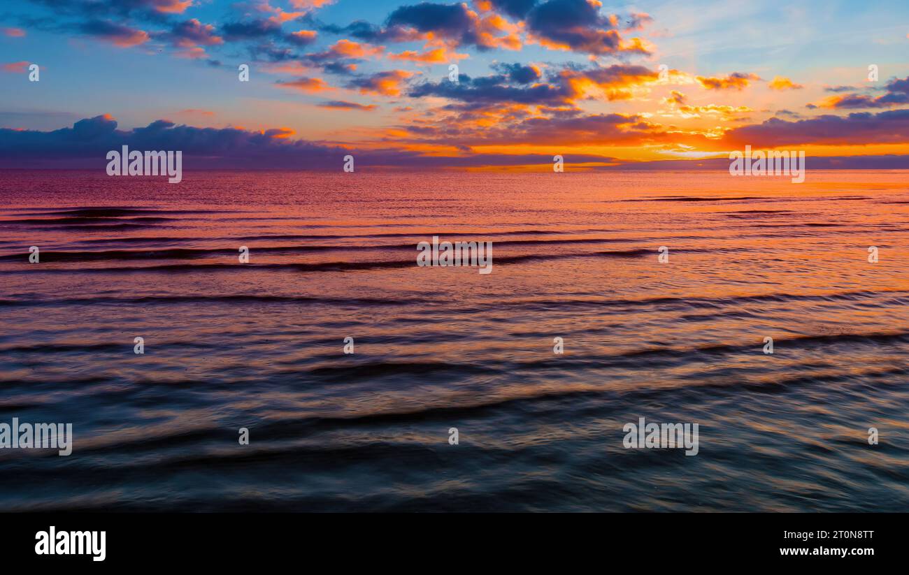 Tranquil evening water surface golden hi-res stock photography and ...