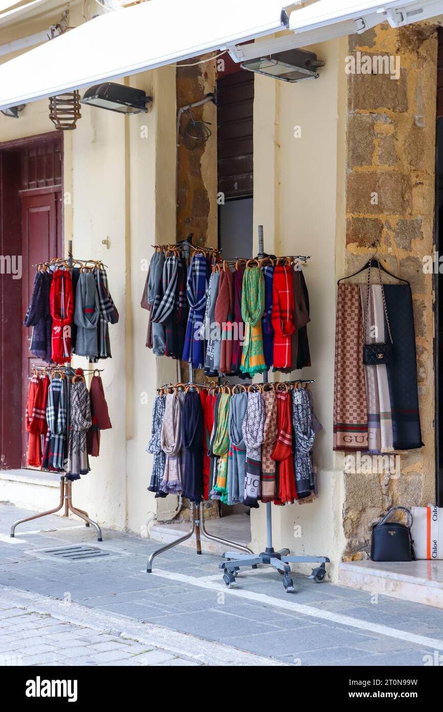 Scarves hanging on a double layered circular round clothing rack ...