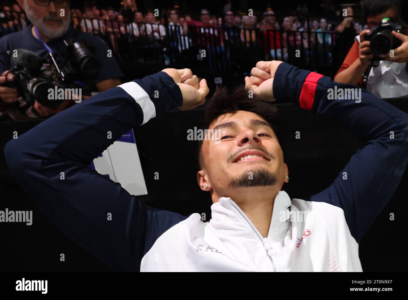 Great Britain's Jake Jarman celebrates winning the gold medal on the ...
