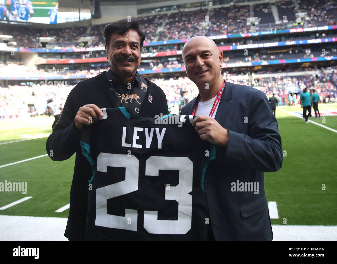 Jacksonville Jaguars owner Shahid Khan (left) and Tottenham Hotspur ...