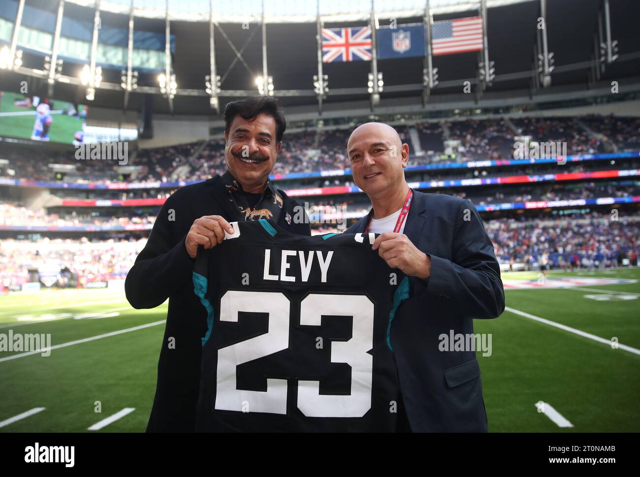 Jacksonville Jaguars owner Shahid Khan (left) and Tottenham Hotspur ...