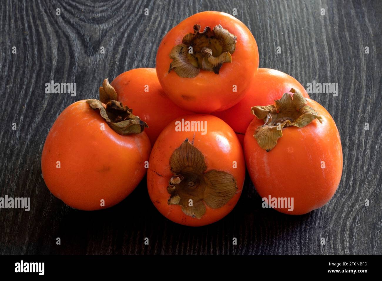 Persimmon tropical fruit hi-res stock photography and images - Alamy