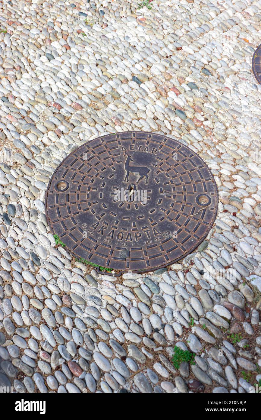 Round manhole cover, a removable plate covering an opening in the ...