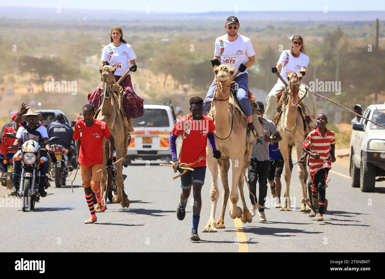 Participants compete during the amarture camel race at the Maralal ...