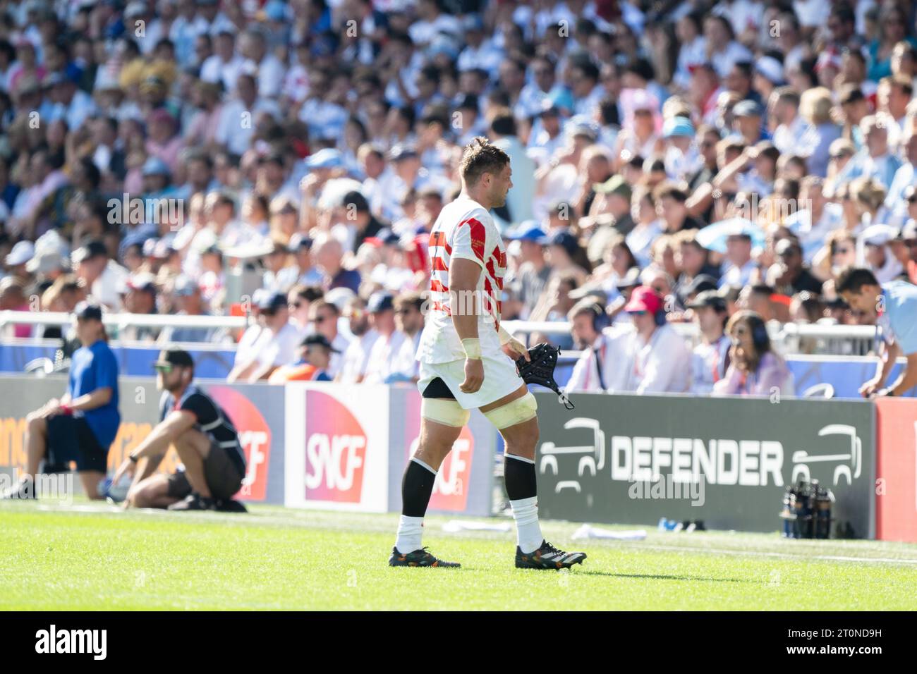 Japan's Pieter Labuschagne leaves the pitch after yellow card during ...