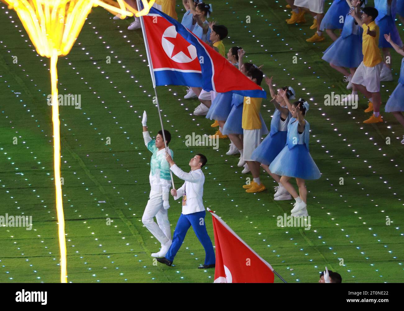N. Korean flag bearer at Asian Games closing North Korean weightlifter ...