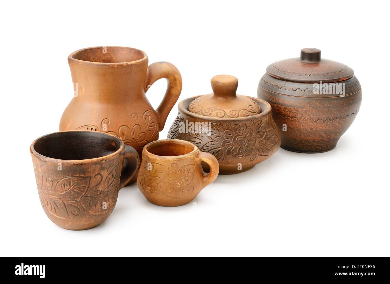 Set clay utensils isolated on white Stock Photo - Alamy