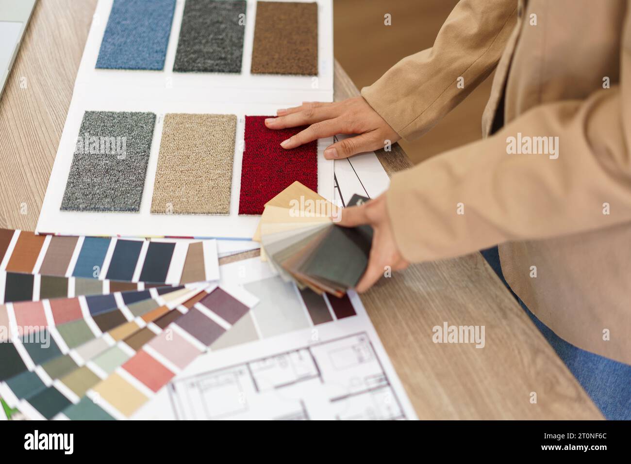 Architectural concept, Female architect choosing color on color swatch ...