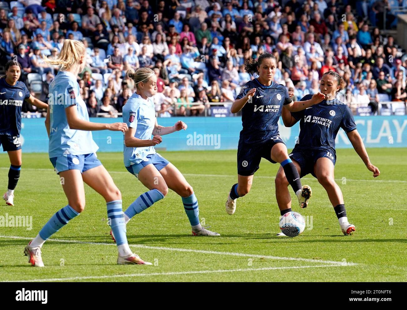 Chelsea's Lauren James (right) and team-mate Jessie Fleming try to gain ...