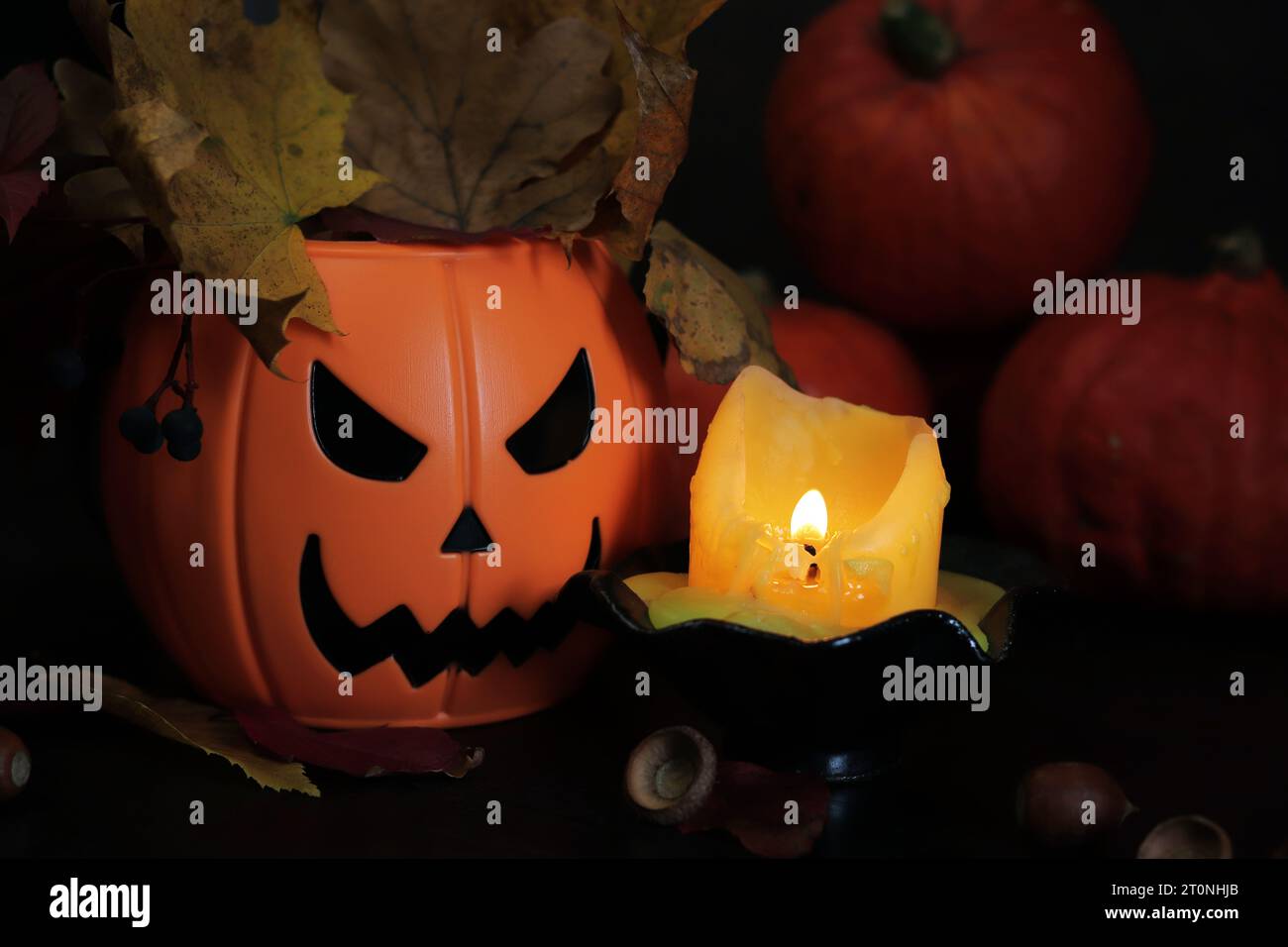 Happy Halloween. A plastic pumpkin bucket with an evil smile. Halloween ...