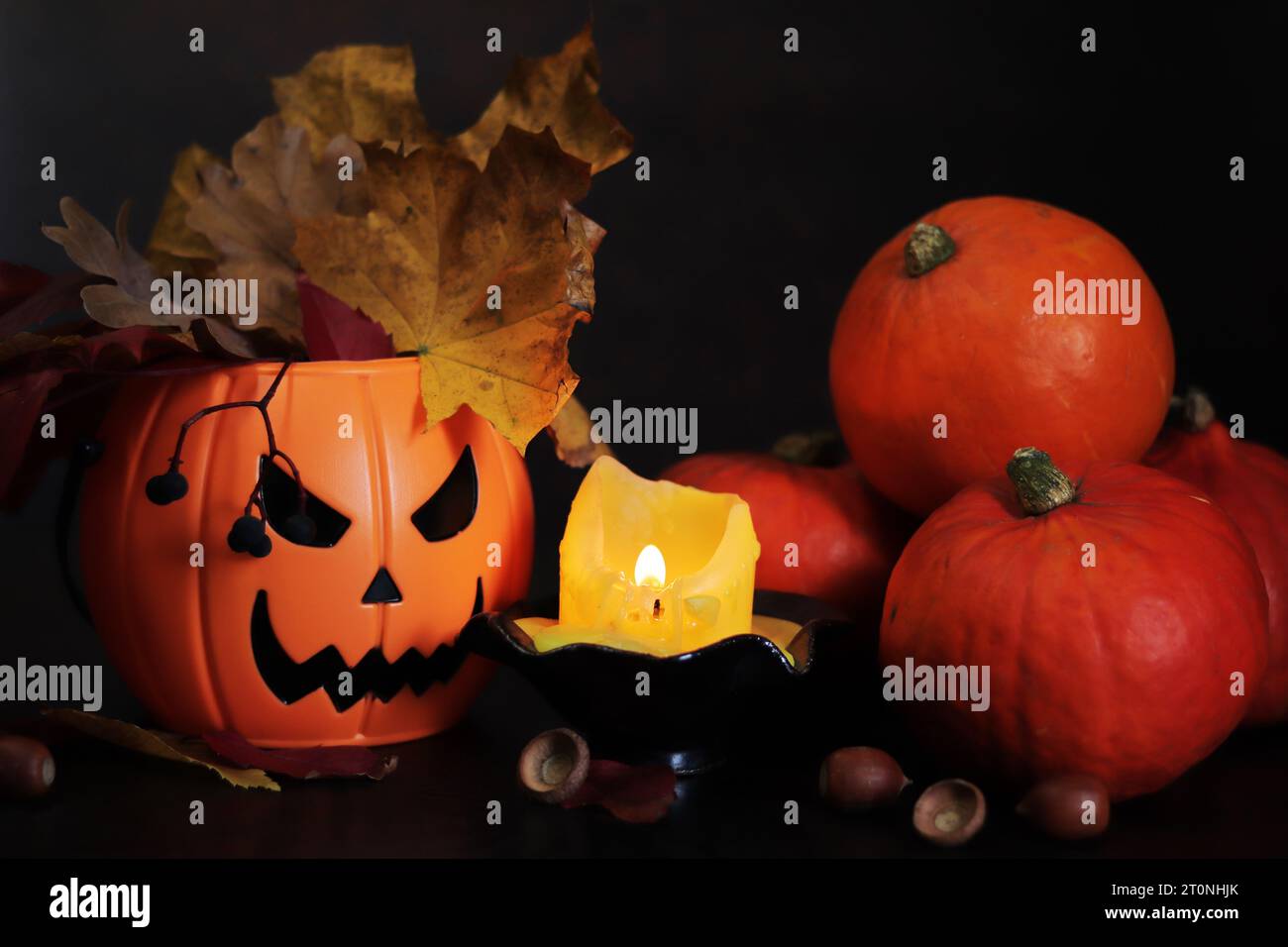 Happy Halloween. A plastic pumpkin bucket with an evil smile. Halloween ...