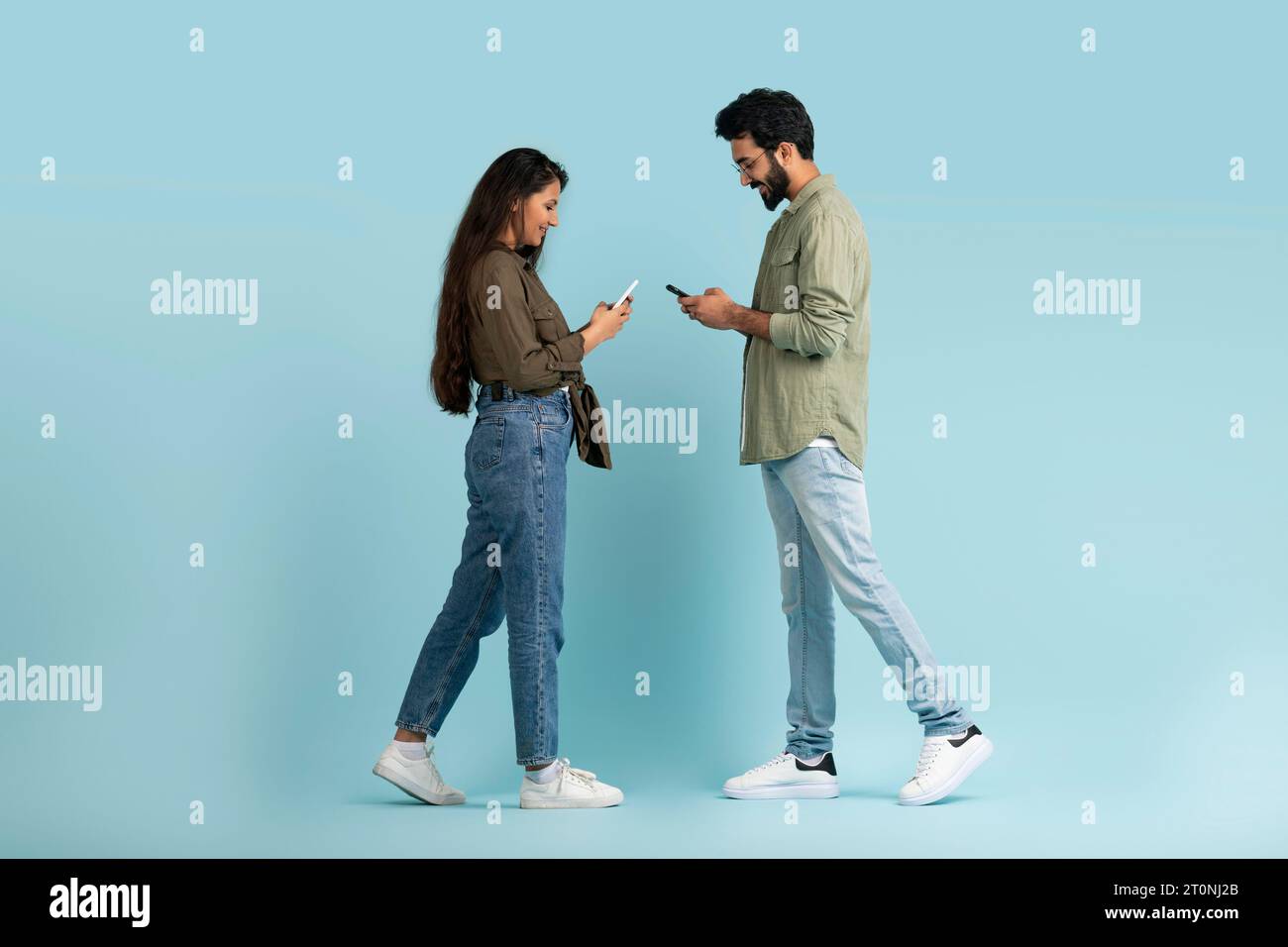 Indian family with phones hi-res stock photography and images - Alamy