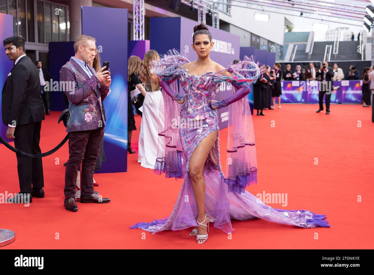 Maksuda Akhter poses for photographers upon arrival for the premiere of ...