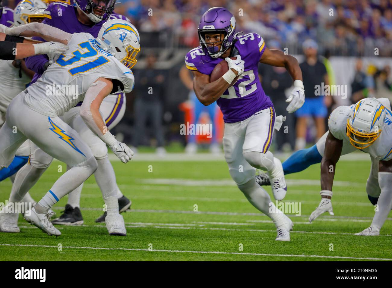 Minnesota Vikings running back Ty Chandler (32) rushes against the Los ...