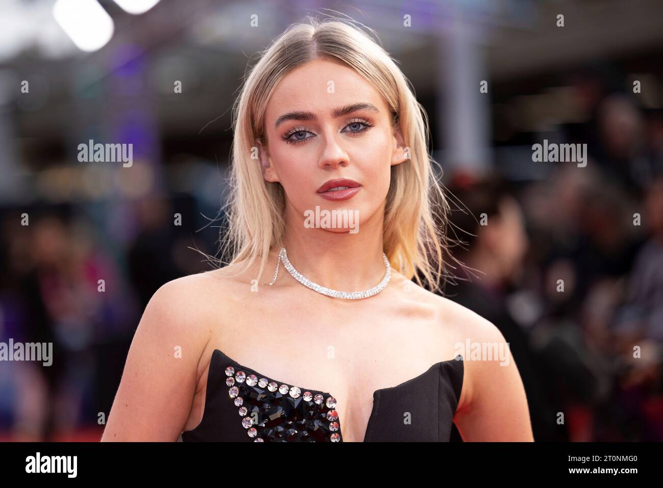 Jess Qualter poses for photographers upon arrival for the premiere of ...