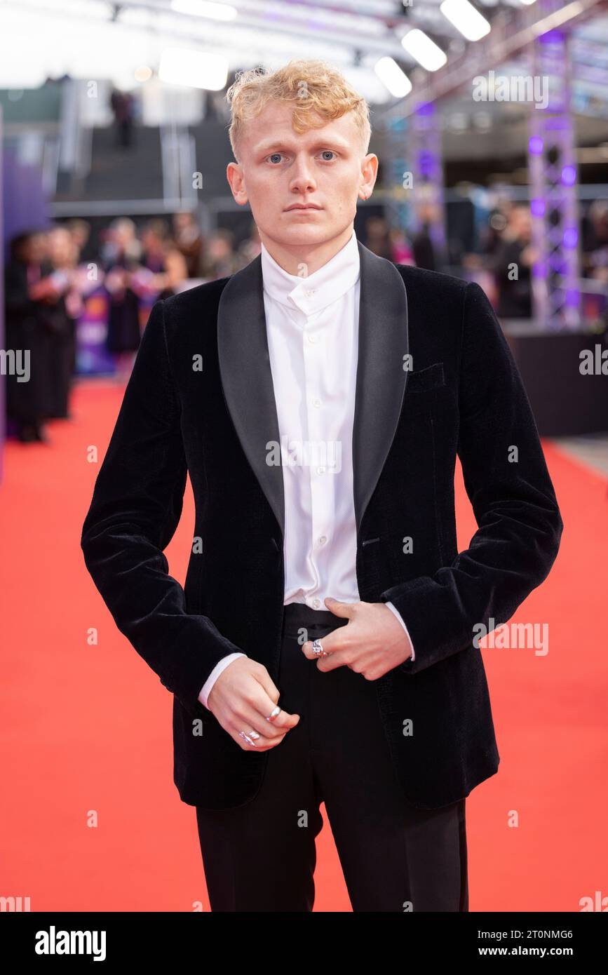 George Jaques poses for photographers upon arrival for the premiere of ...
