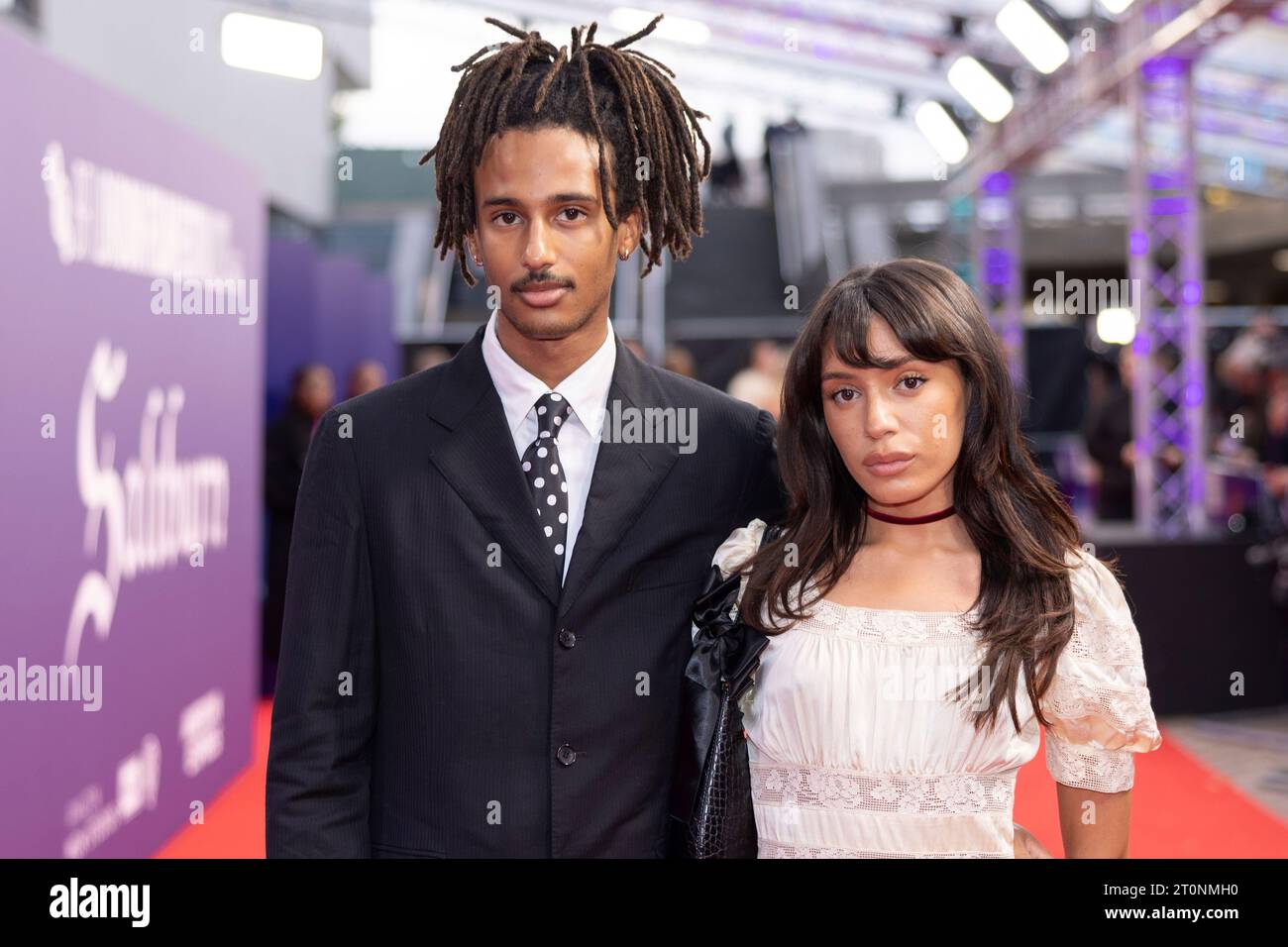 Daniel AJ and Shelley Luvyute pose for photographers upon arrival for ...