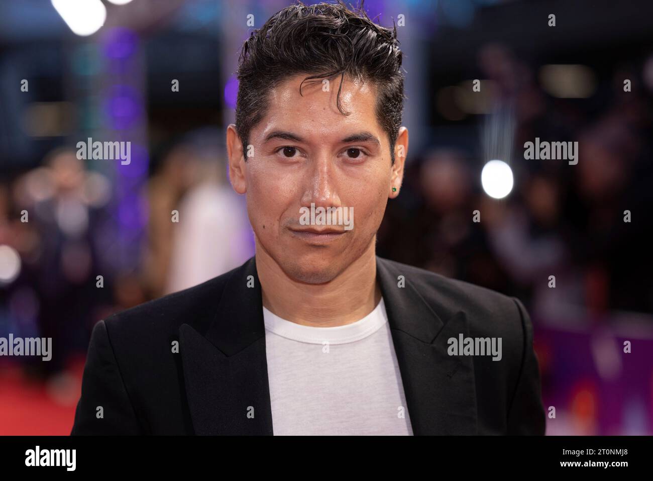 Carlos Eric Lopez poses for photographers upon arrival for the premiere of the film 'Saltburn ...