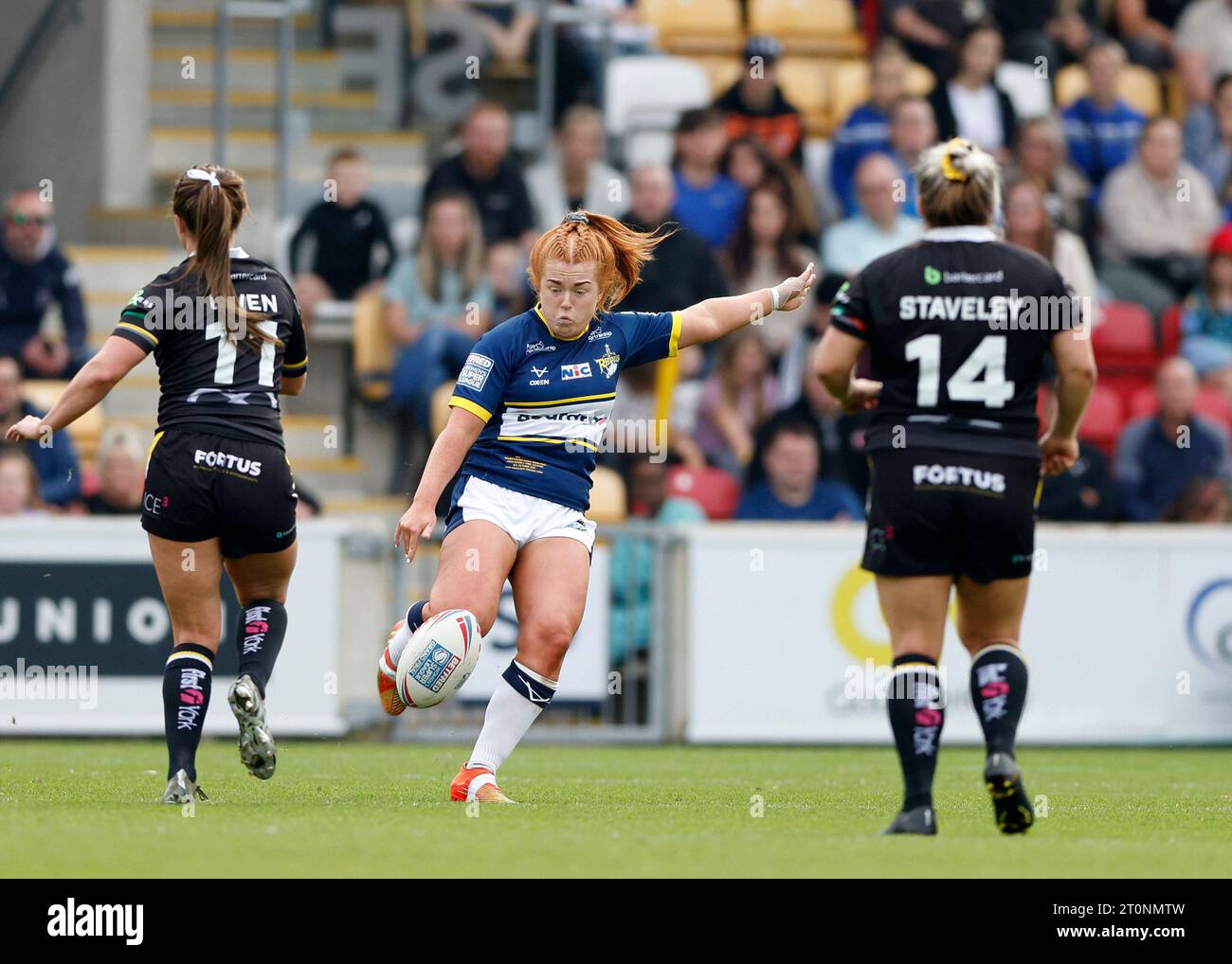Leeds Rhinos' Caitlin Casey kicks the ball during the Betfred Women's ...