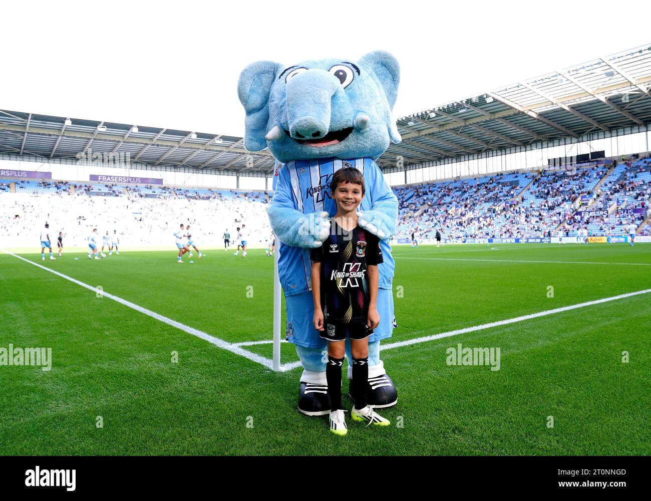 A Coventry City match day mascot poses for a photo with Sky Blue Sam ...