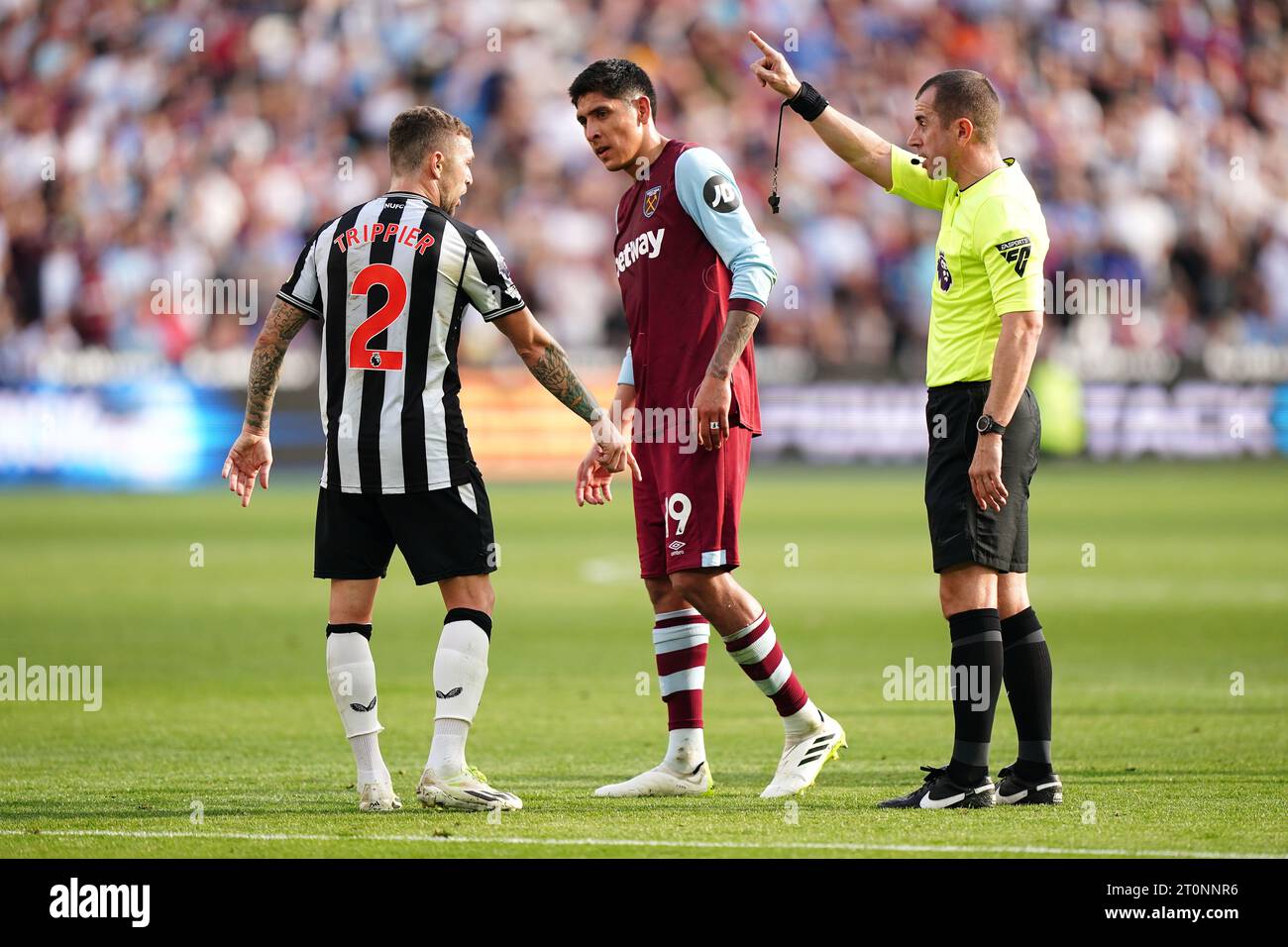 Newcastle United's Kieran Trippier (left) in discussion with referee ...