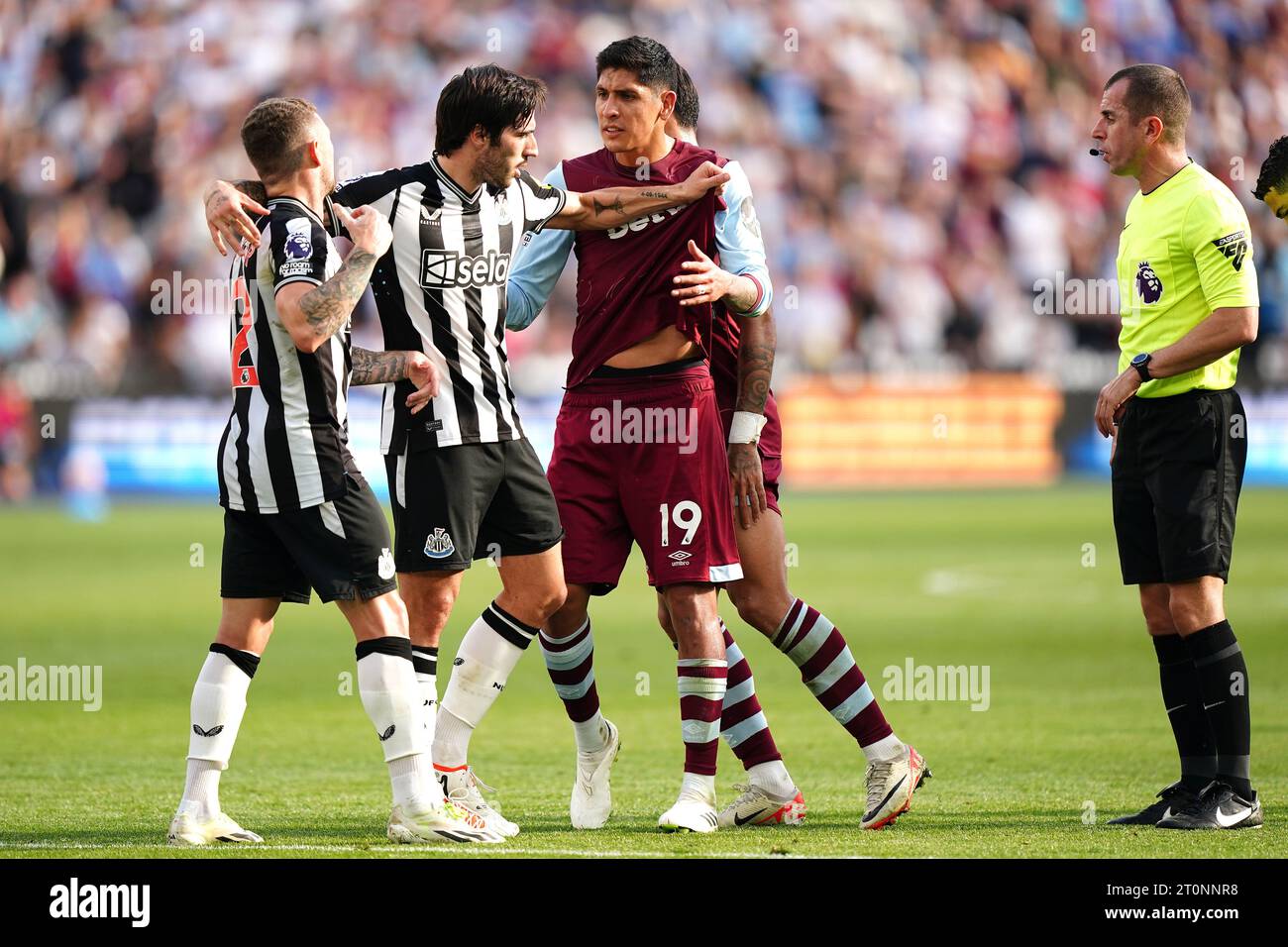 Newcastle United's Kieran Trippier (left) and West Ham United's Edson ...