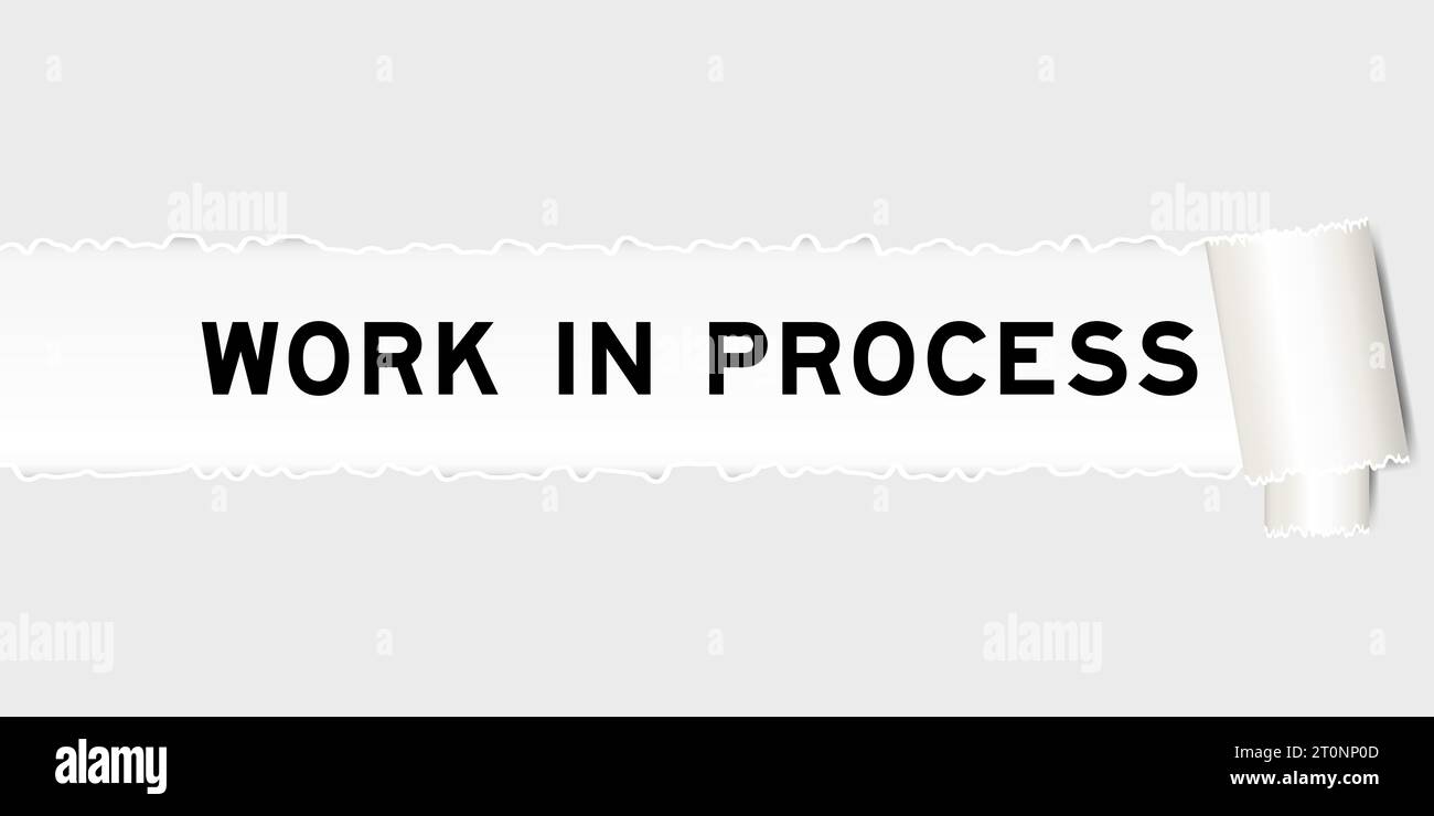 Ripped gray paper background that have word work in process under torn ...