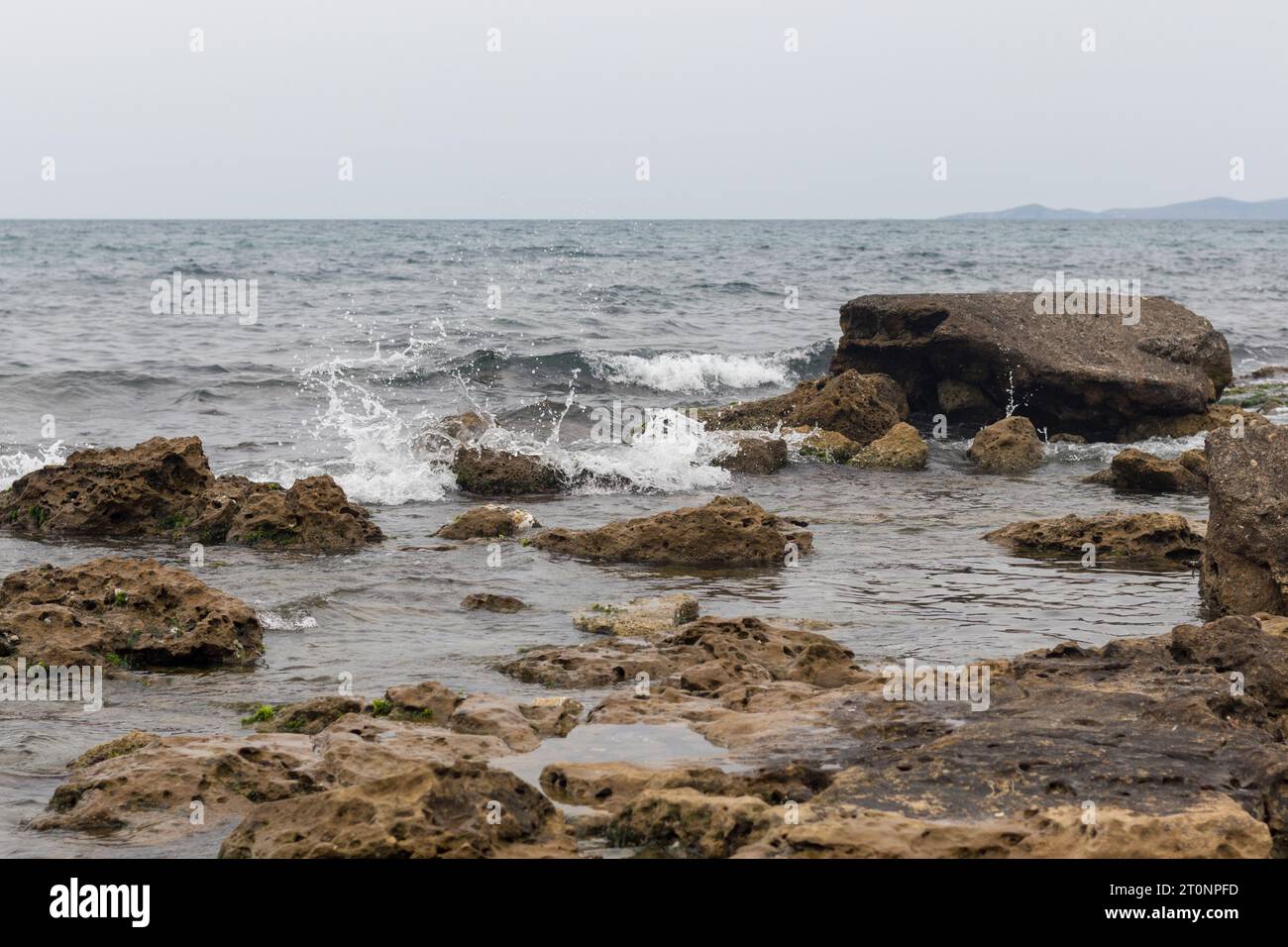 Rocky beach tourism hi-res stock photography and images - Alamy