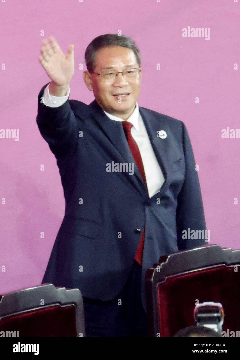 Chinese Premier Li Qiang waves during the closing ceremony of the Asian ...