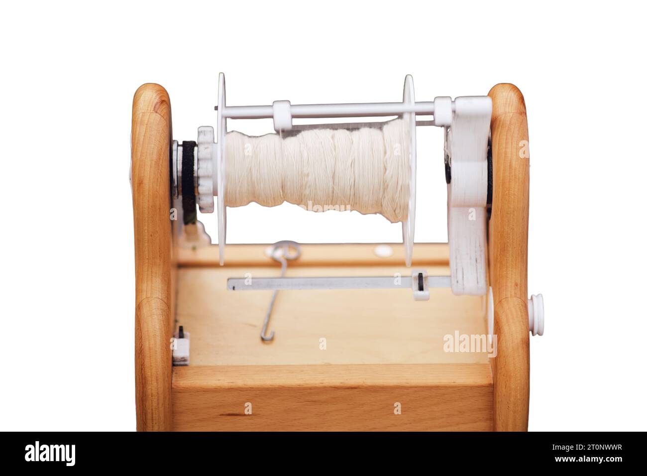 The spinning equipment includes a wooden spindle and a hand tool for ...