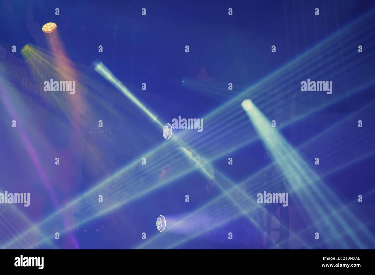 Blue lighting effect in the dark with rays of light from the stage ...