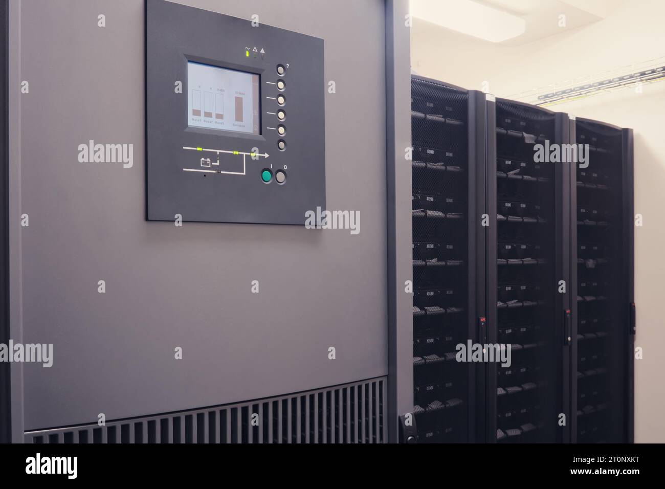 In the server room, the UPS battery is connected to an emergency power ...