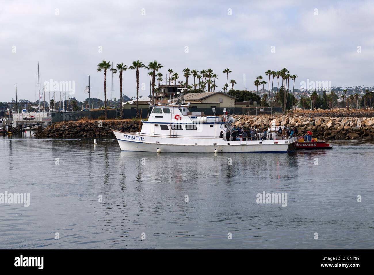 Sportfishing vessel Tribute and the anglers aboard are being assisted ...