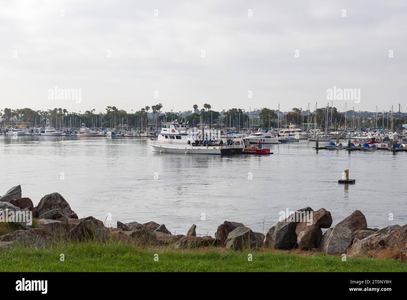 Sportfishing vessel Tribute and the anglers aboard are being assisted ...