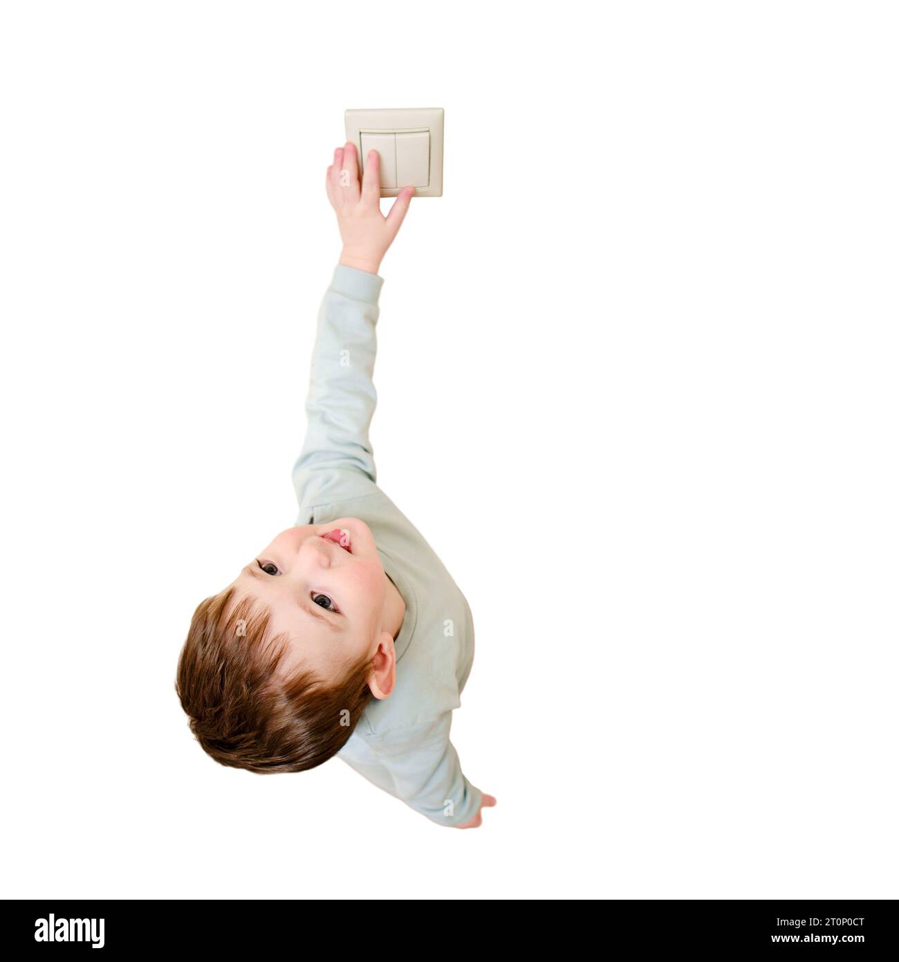 Little baby turns on the light by pressing the switch, isolated on ...