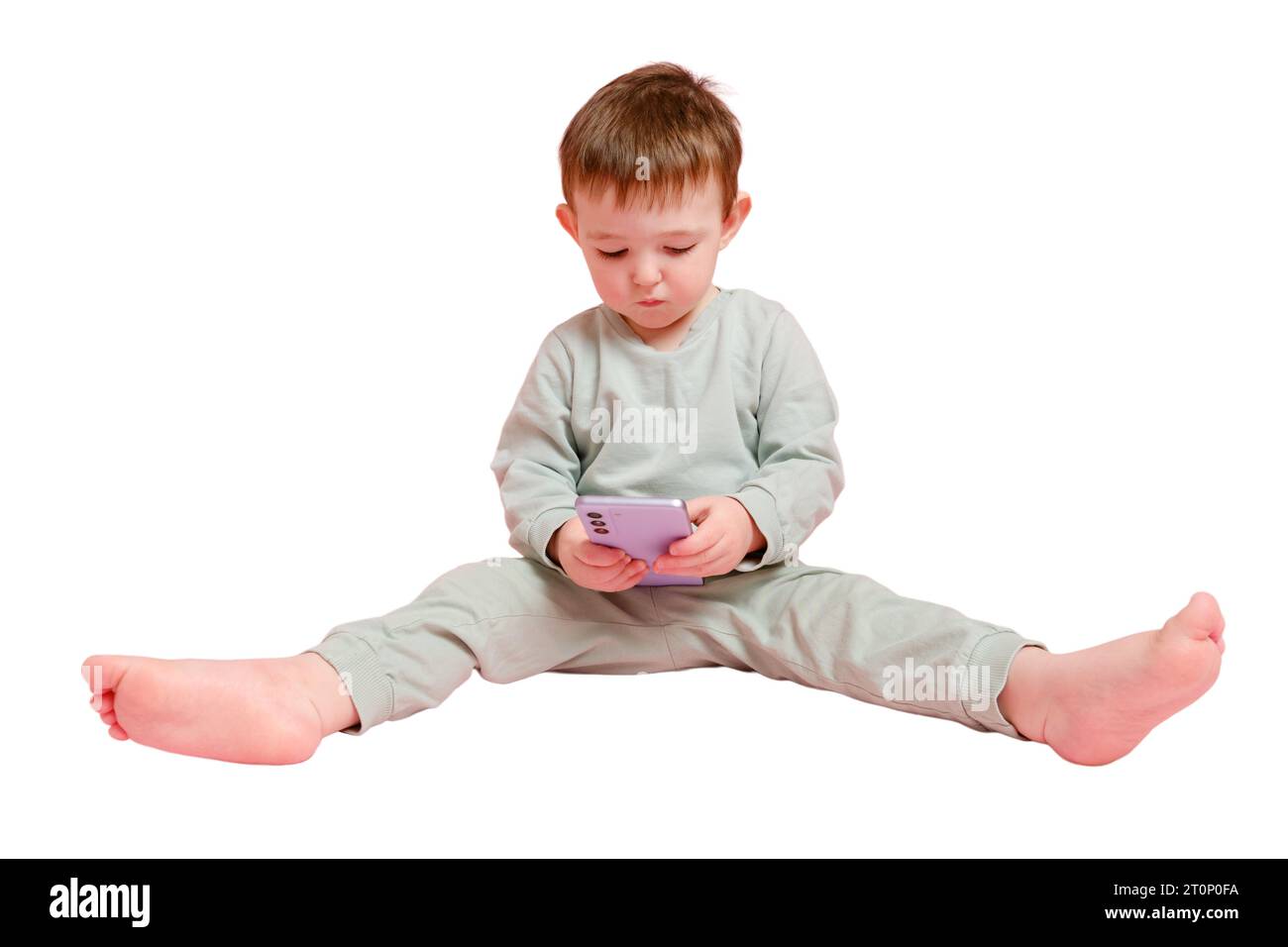 Happy toddler baby with mobile phone on studio, isolated on white ...