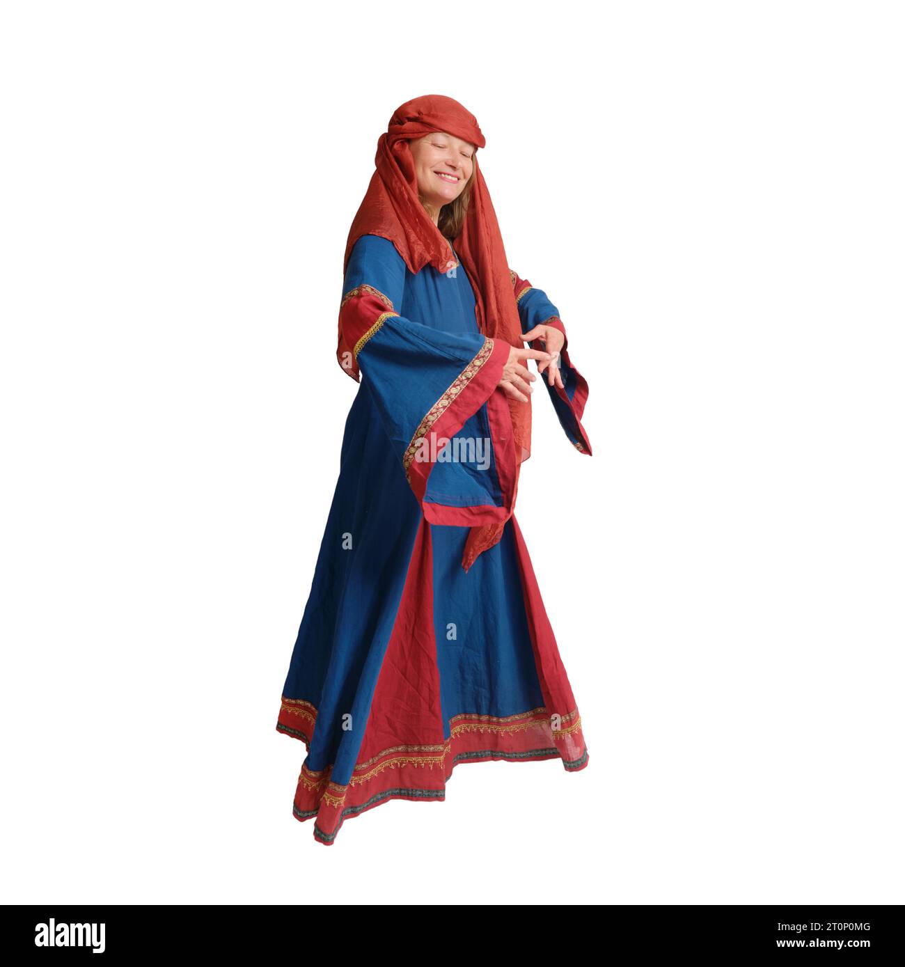 Woman in medieval European dress dancing on studio background, isolated ...