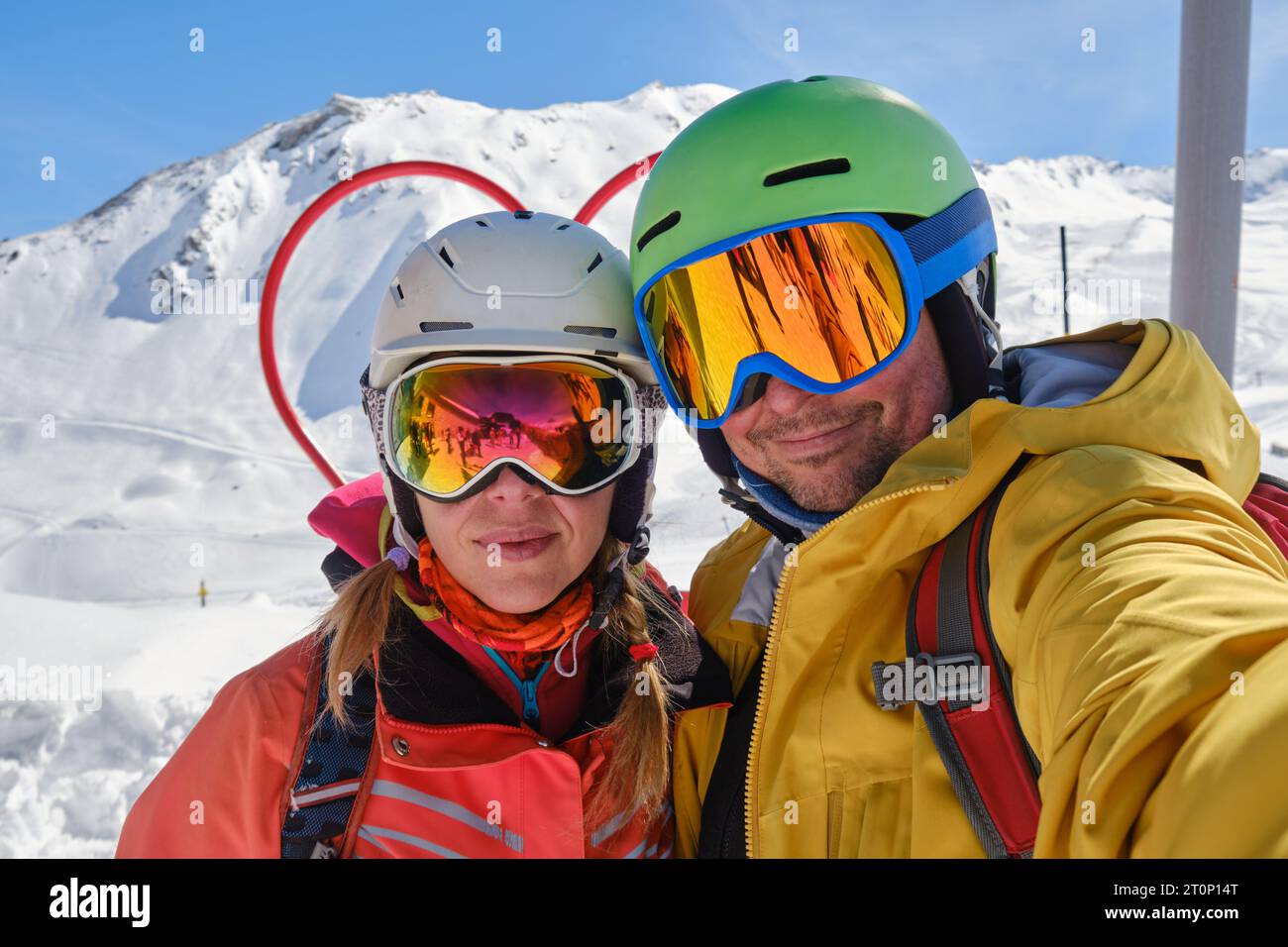 Skiers couple take a selfie photo in Tignes-Val d'Isere ski resort ...