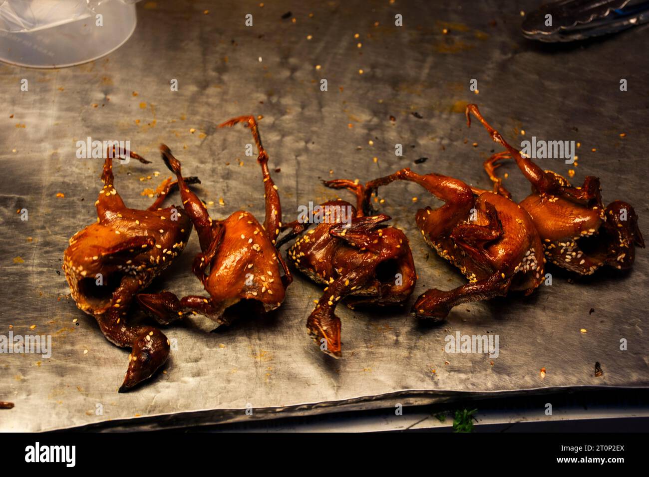 Roasted poultry quail in marinade seasoning or grilled partridge ...