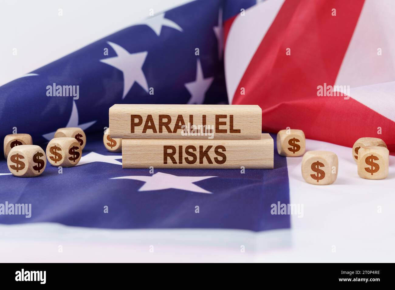 Economy and finance concept. On the flag of the United States lie cubes ...