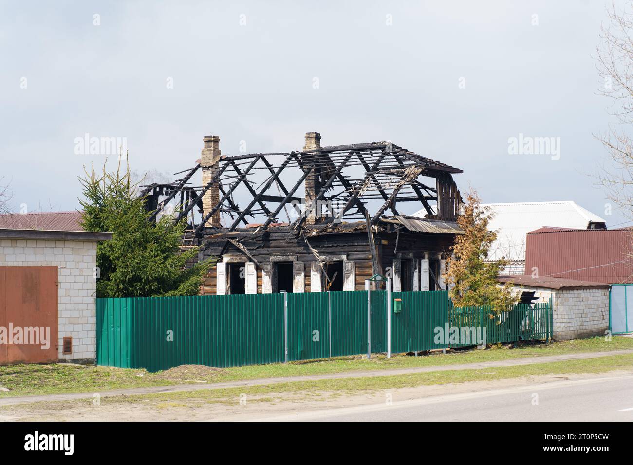 The burnt premises of the house and the roof with the attic after the ...