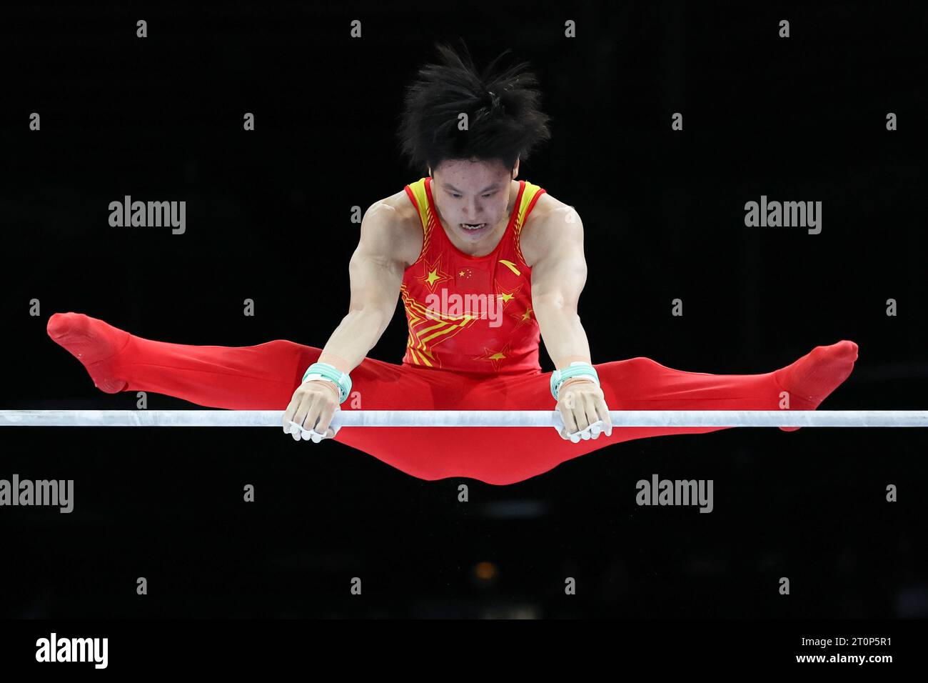 China's Su Weide competes on the horizontal bar to win the bronze medal ...